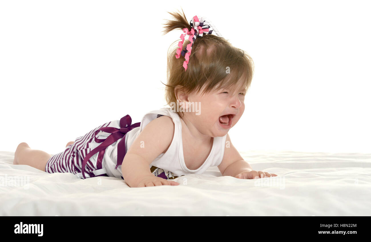Adorable baby girl crying Stock Photo - Alamy
