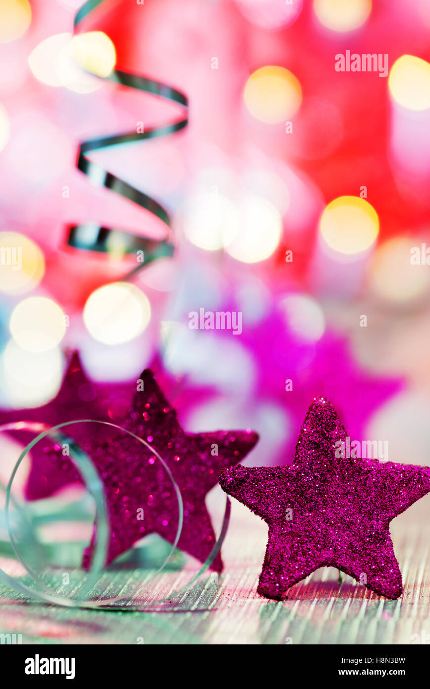 Christmas background with three stars and colored glitter Stock Photo ...
