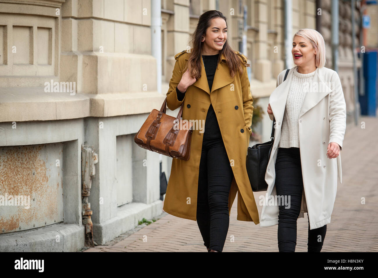 Women walking and talking outside hi-res stock photography and images ...