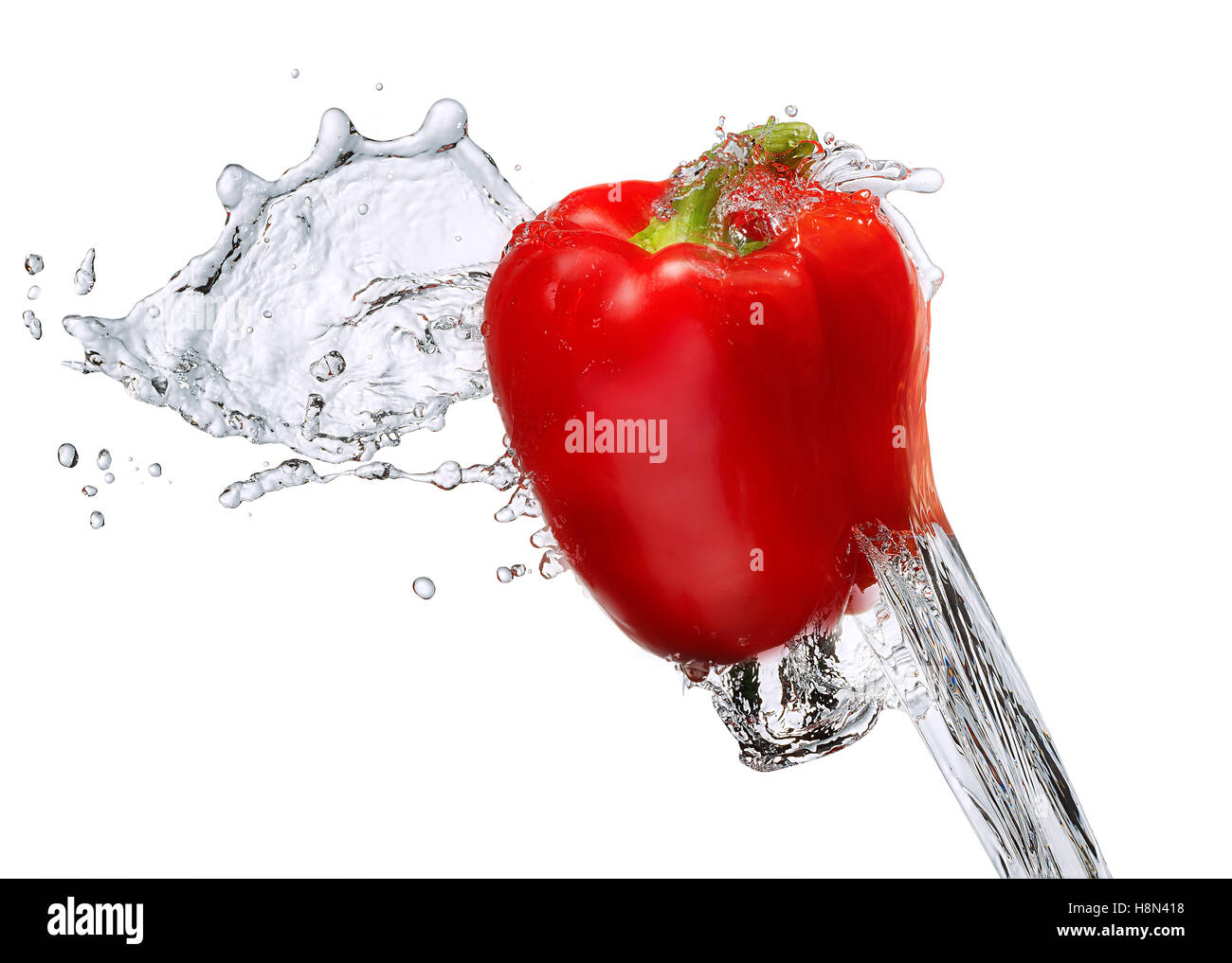 Water splash with bell pepper isolated Stock Photo - Alamy