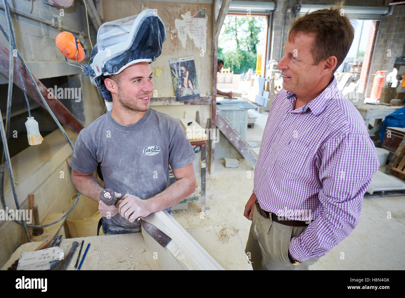 A stonemason shapes part of a frieze in a workshop Stock Photo - Alamy