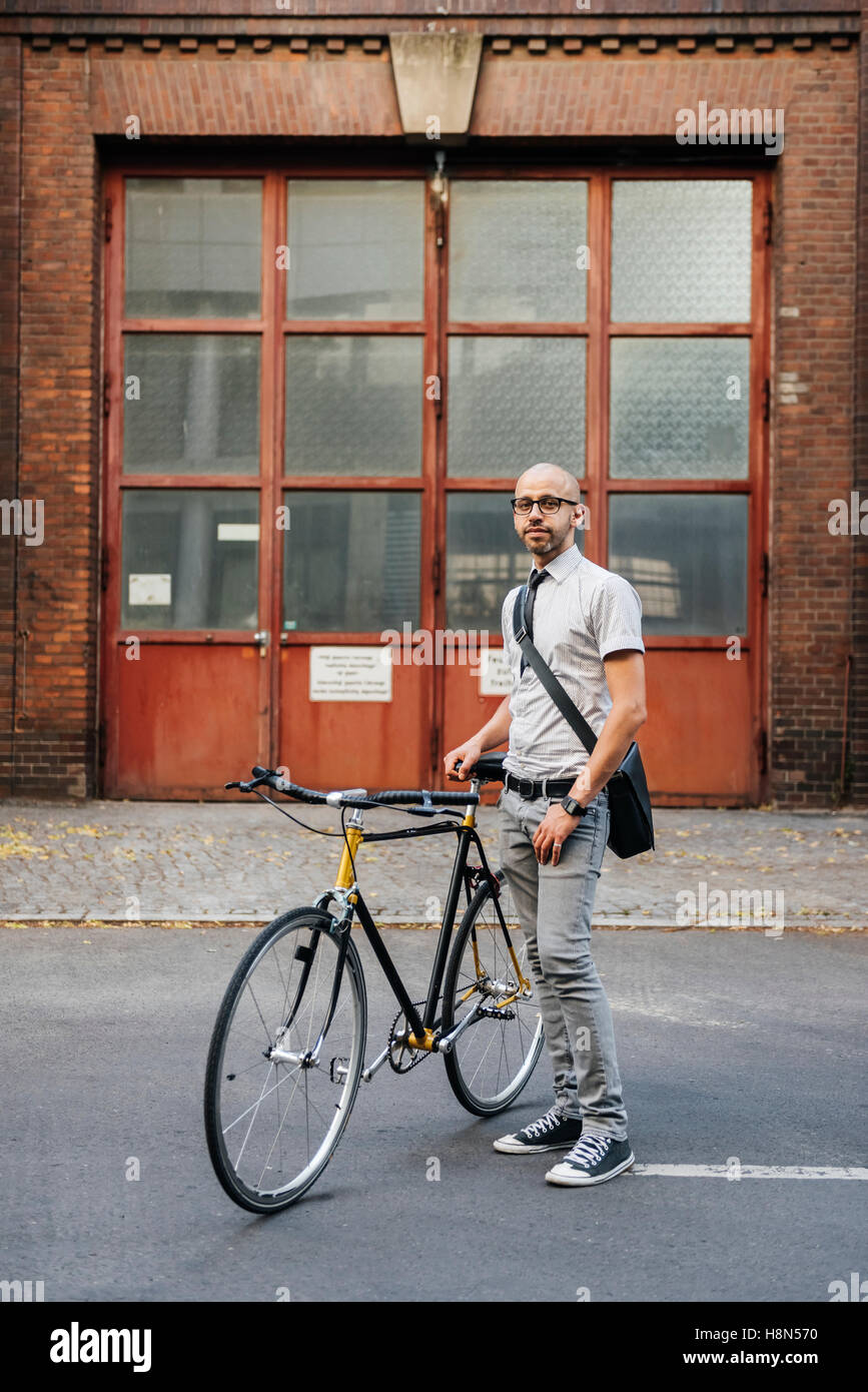 Man pedaling bicycle hi-res stock photography and images - Alamy