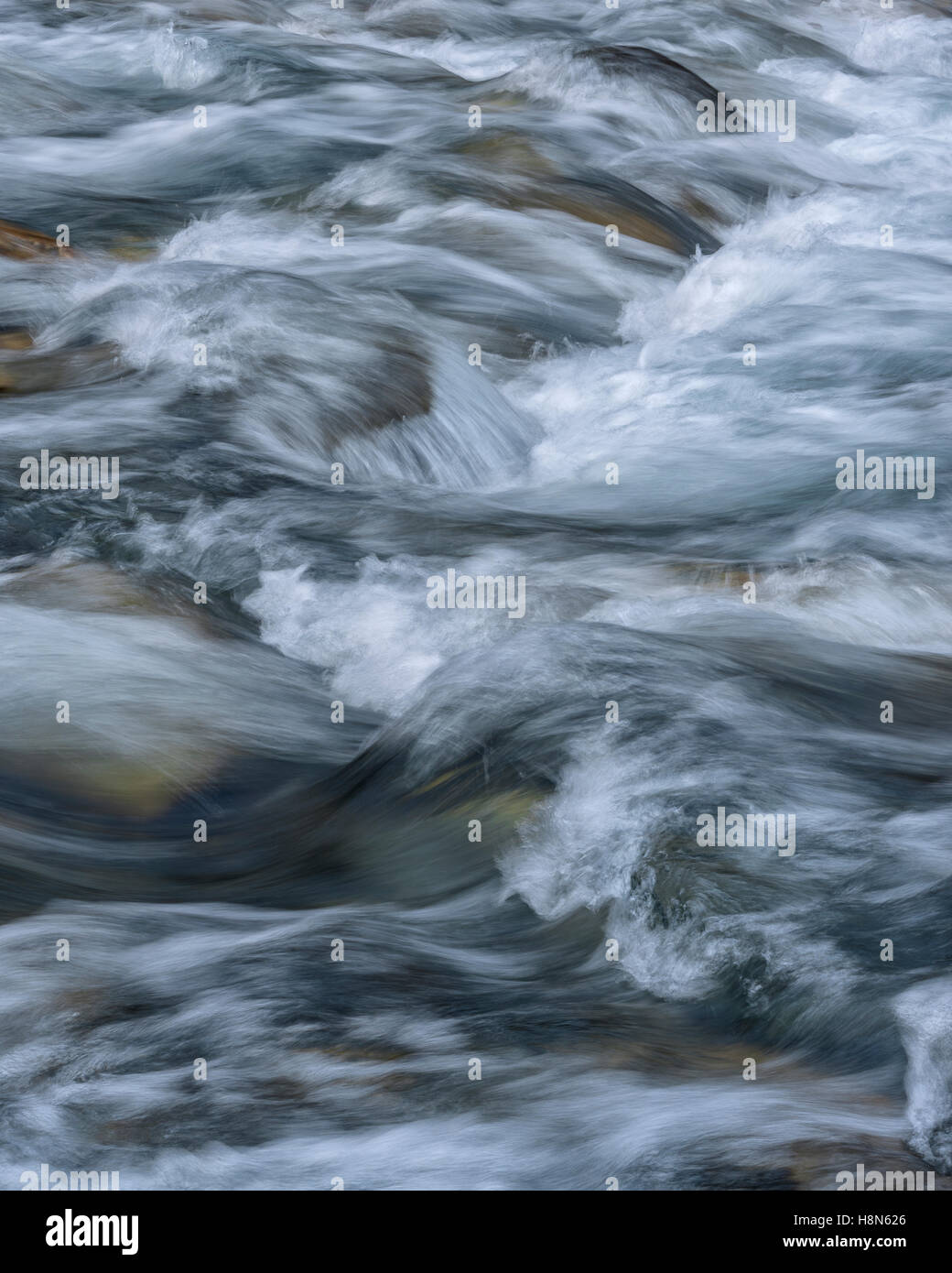 Water flowing in stream Stock Photo - Alamy