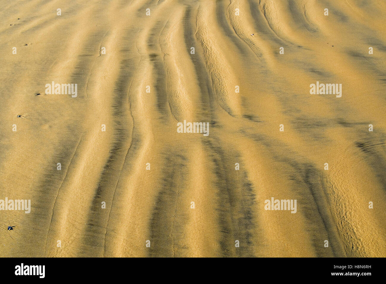 Full frame take of rippled beach sand texture Stock Photo - Alamy