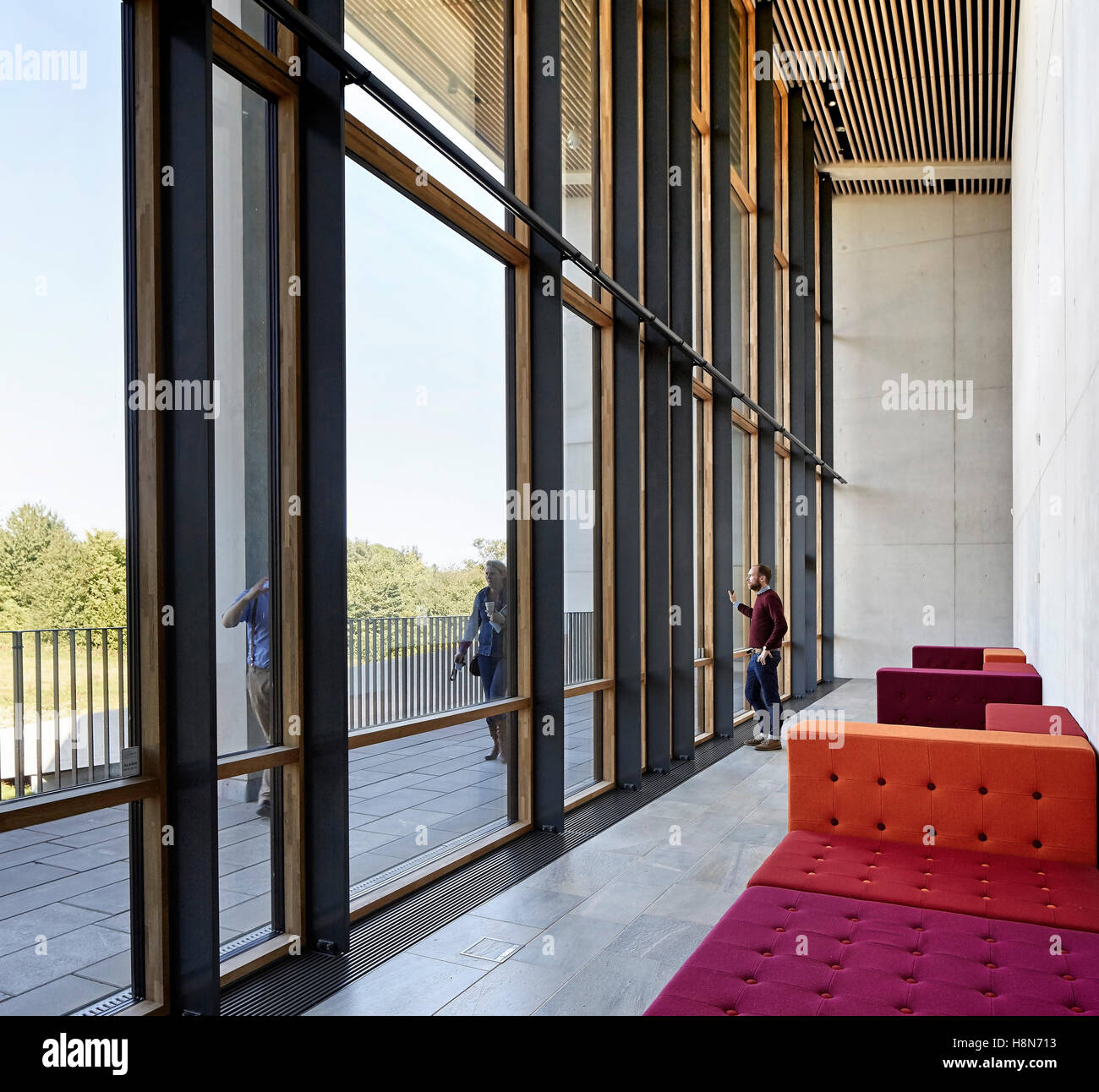Corridor with seating and window wall. Moesgaard Museum, Aarhus ...
