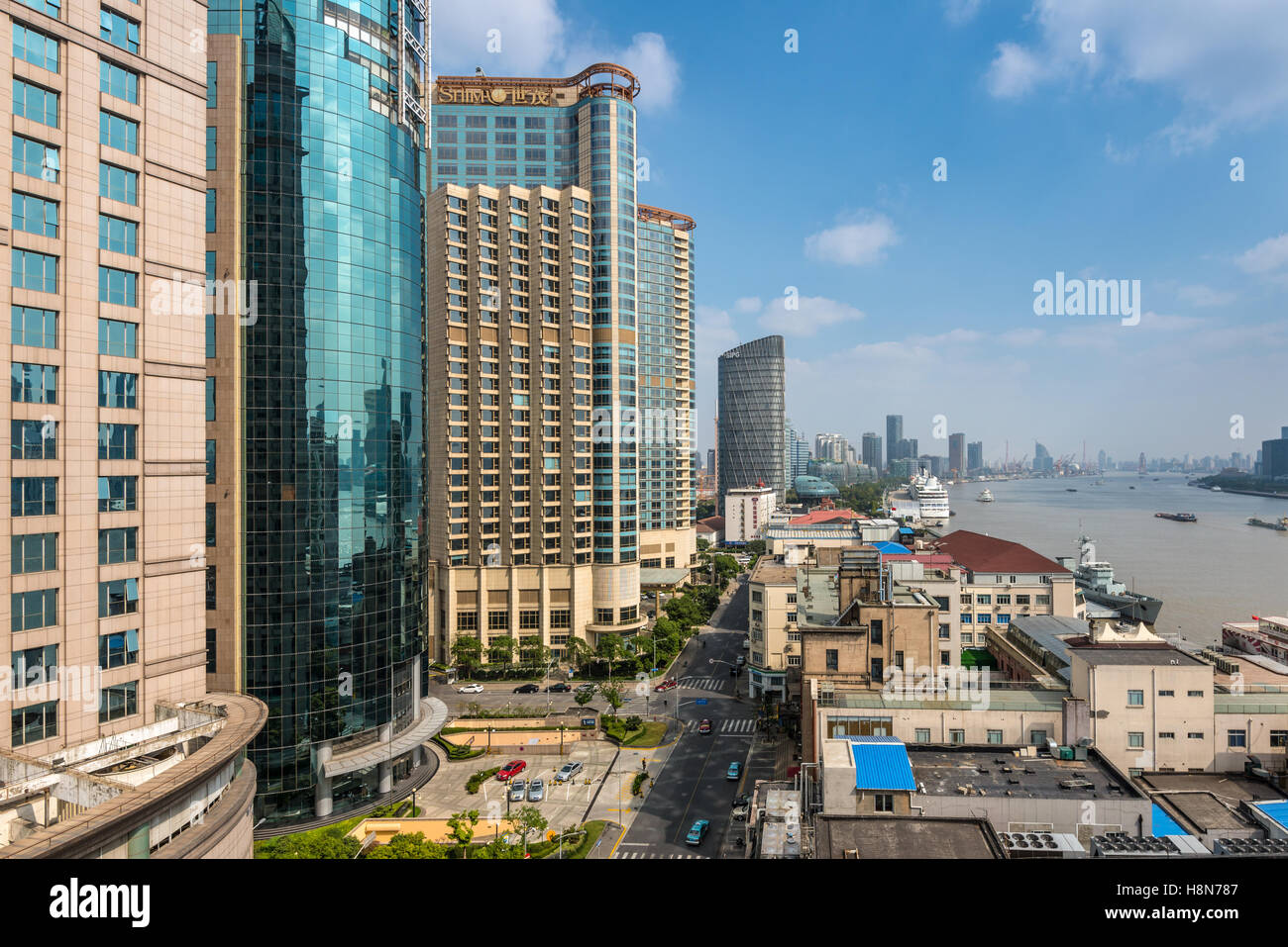 Modern architecture of Shanghai with coast and cruise ship terminal ...