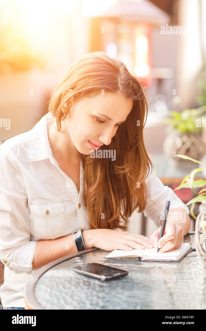 Woman with long list hi-res stock photography and images - Alamy