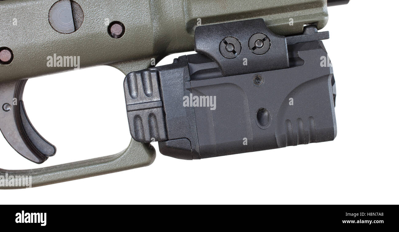 Light and laser mounted in front of a pistols trigger Stock Photo - Alamy