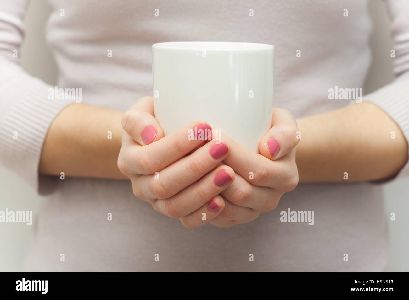 Young woman hands cup hi-res stock photography and images - Alamy