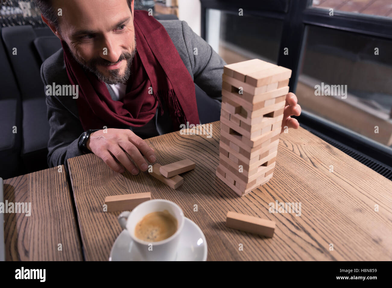 Joyful emotional man relaxing after work Stock Photo - Alamy