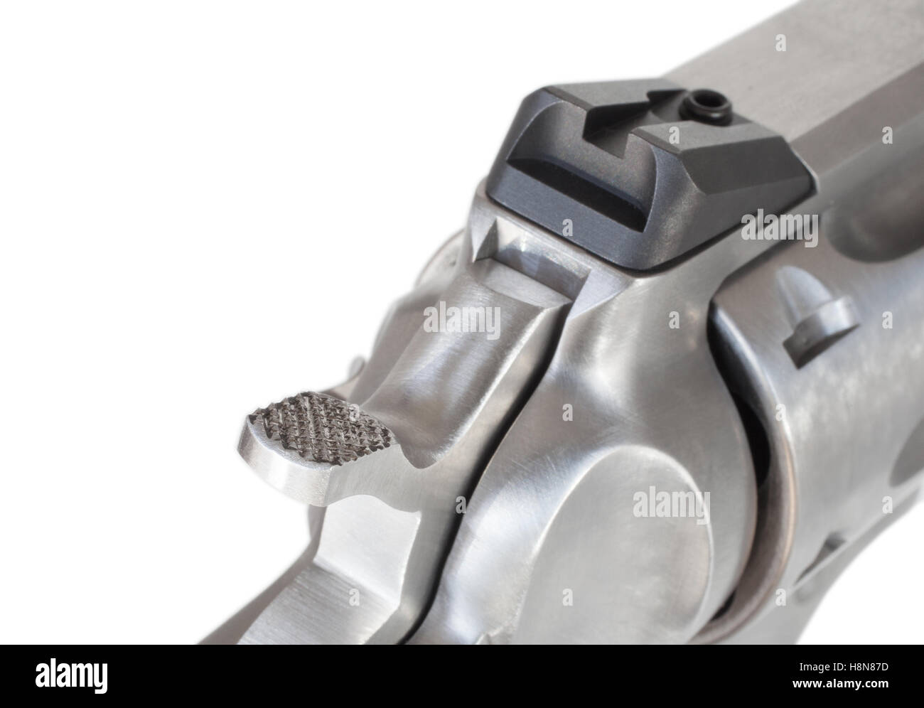 Hammer on a stainless revolver isolated on white Stock Photo - Alamy
