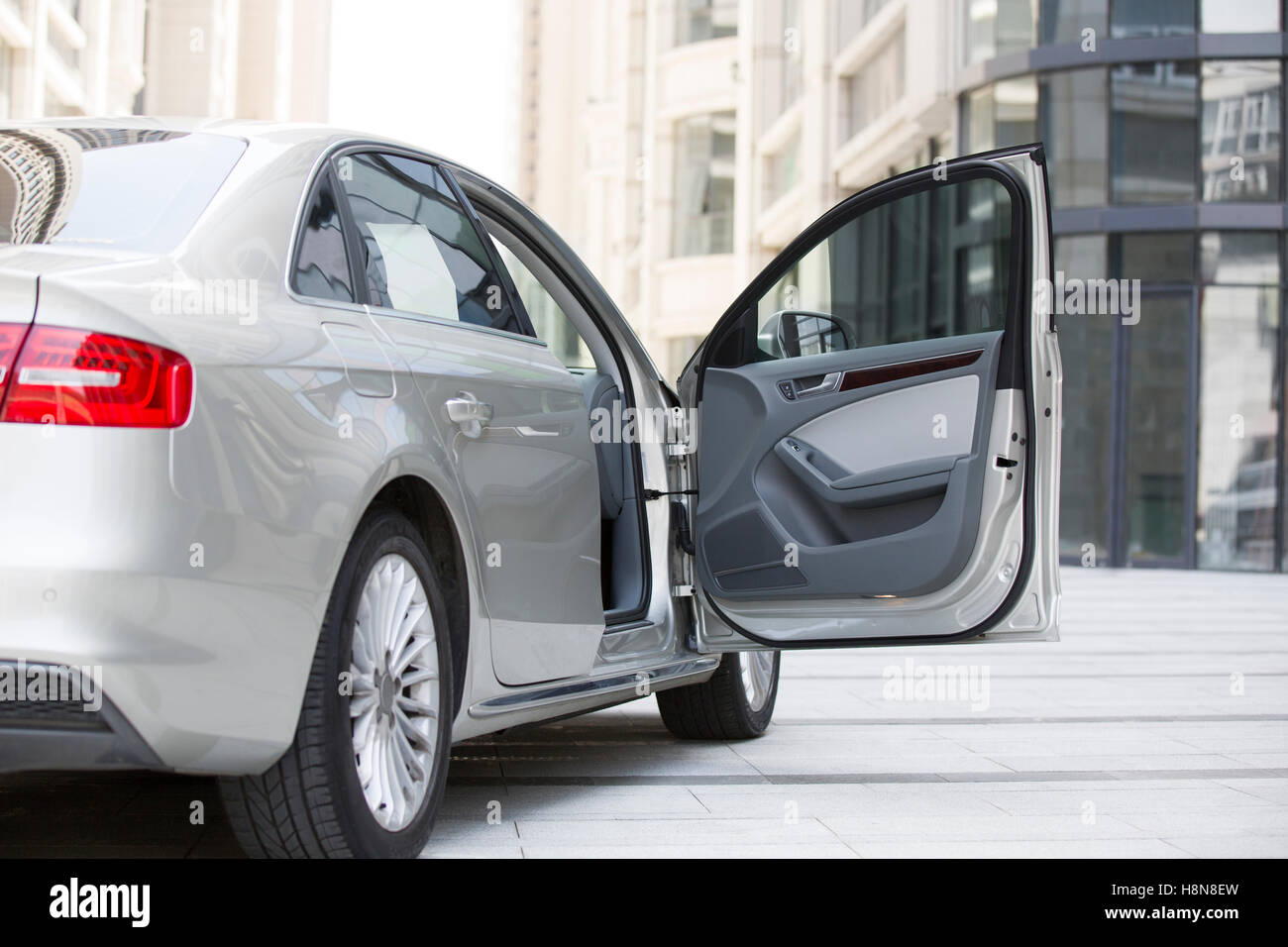 Opened car door Stock Photo - Alamy