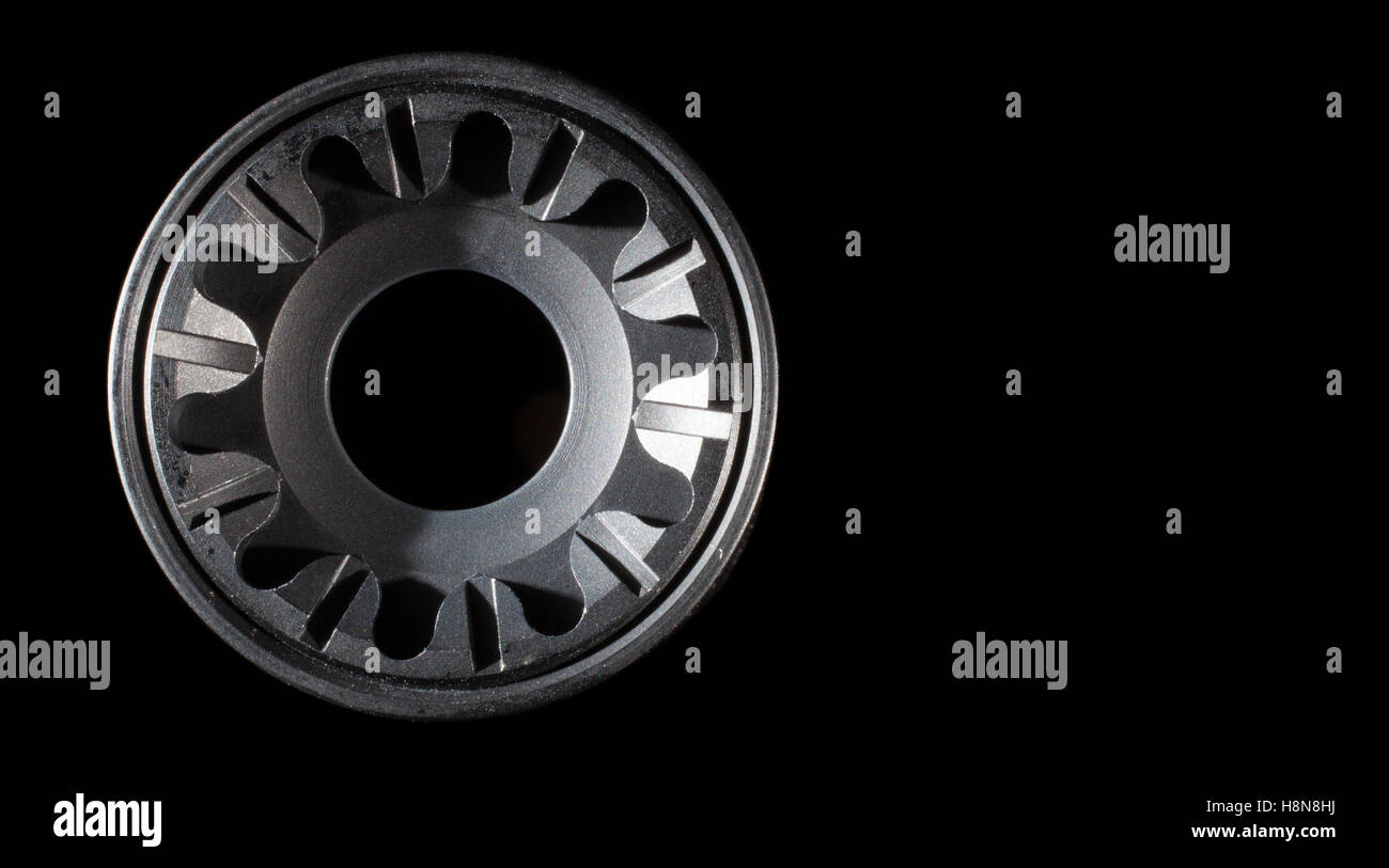 Front side of a silencer on a black background Stock Photo - Alamy