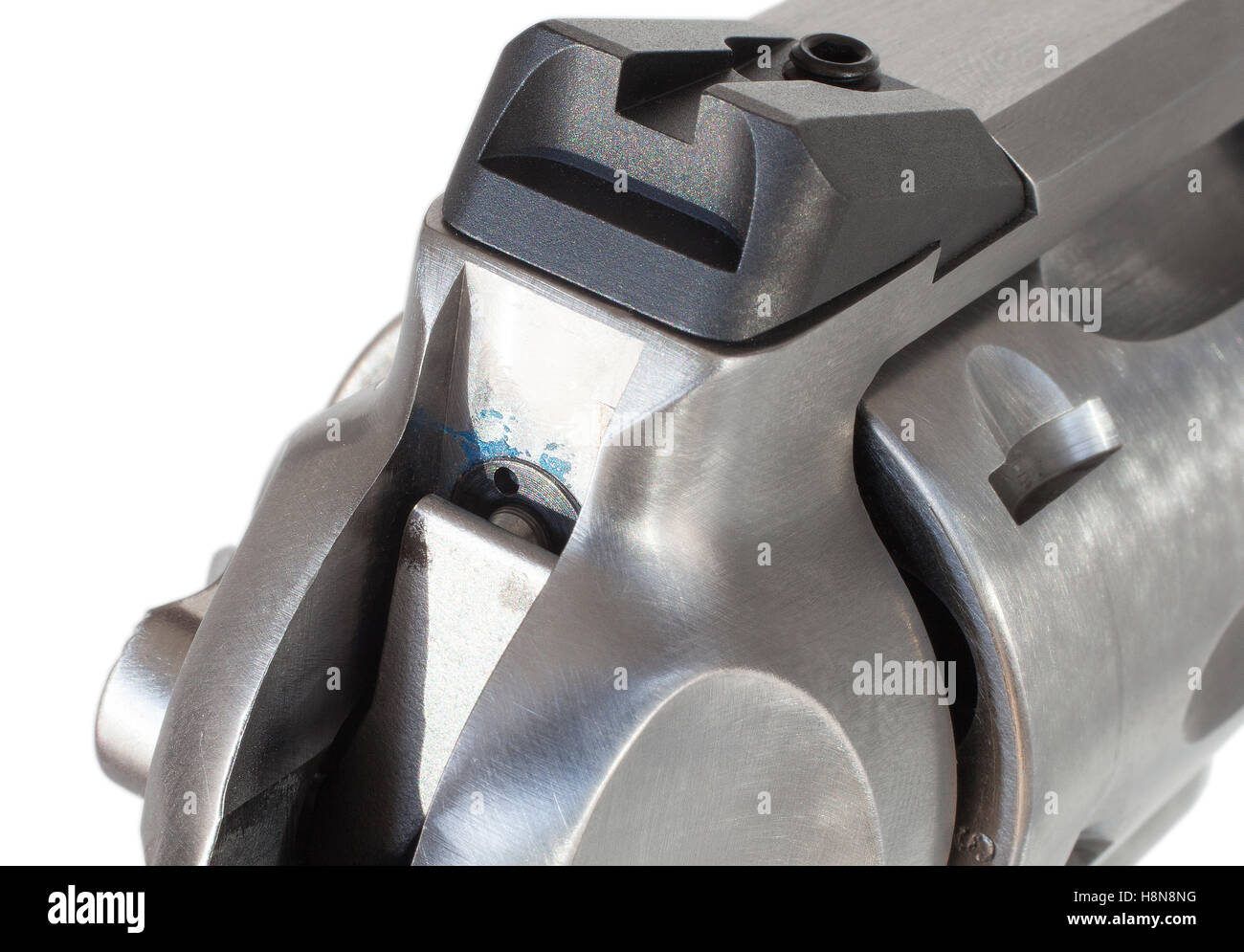 Firing pin cover at the back of a revolver isolated on white Stock ...