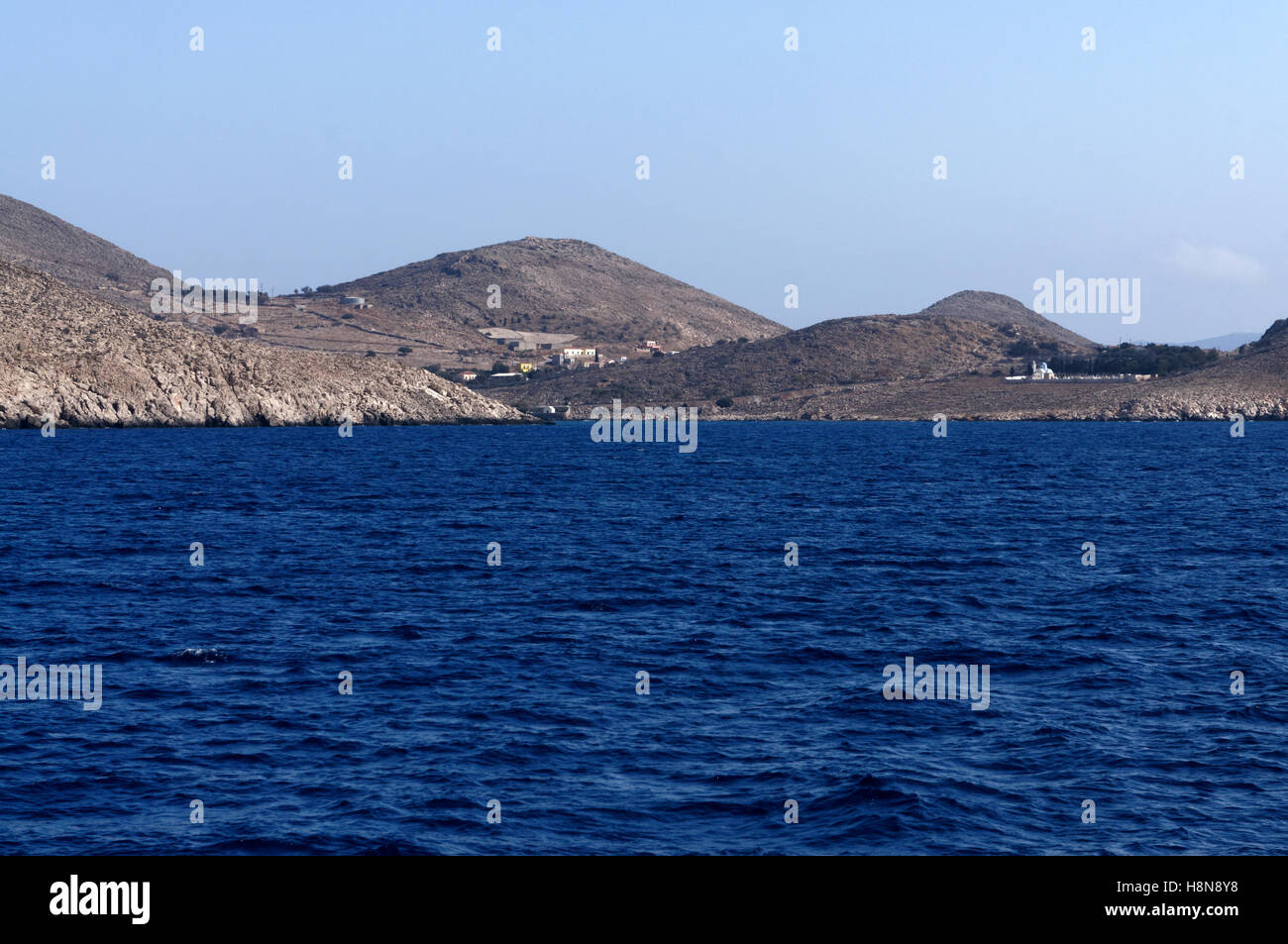Remote and wild mountain landscape of Chalki Island from the sea near ...
