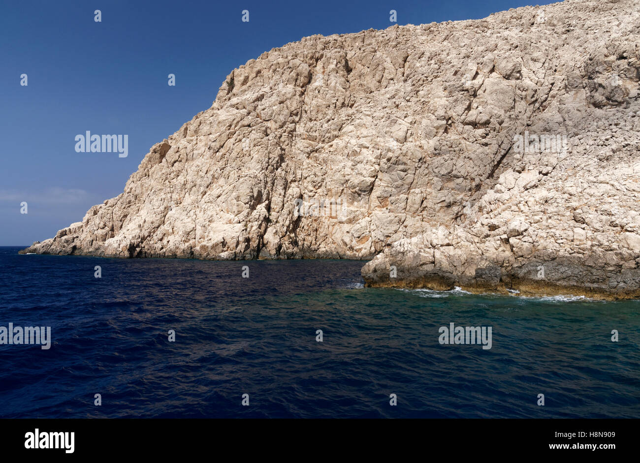 Remote and wild mountain landscape of Chalki Island from the sea near ...