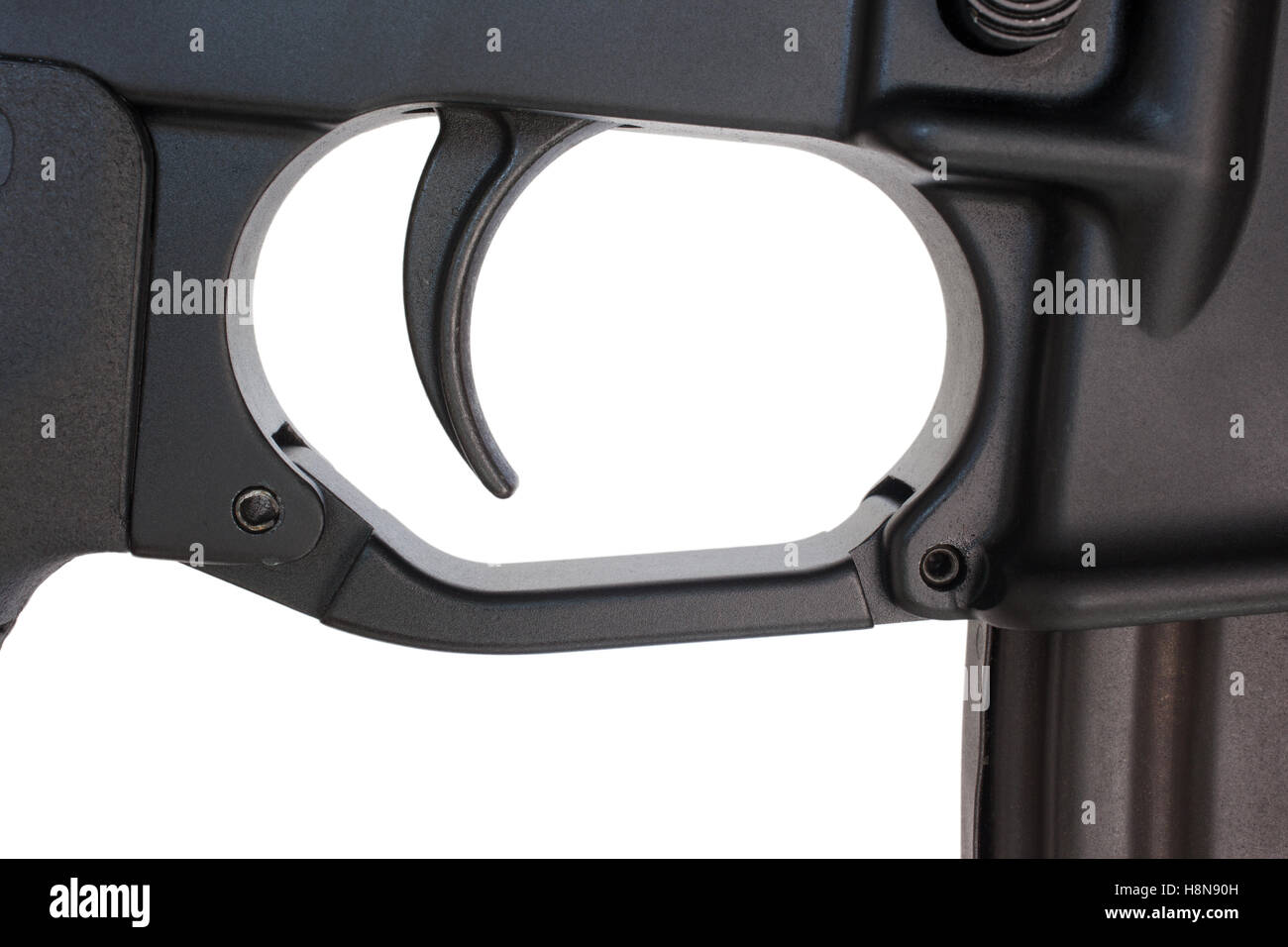 Black metal trigger on a rifle isolated on white Stock Photo - Alamy