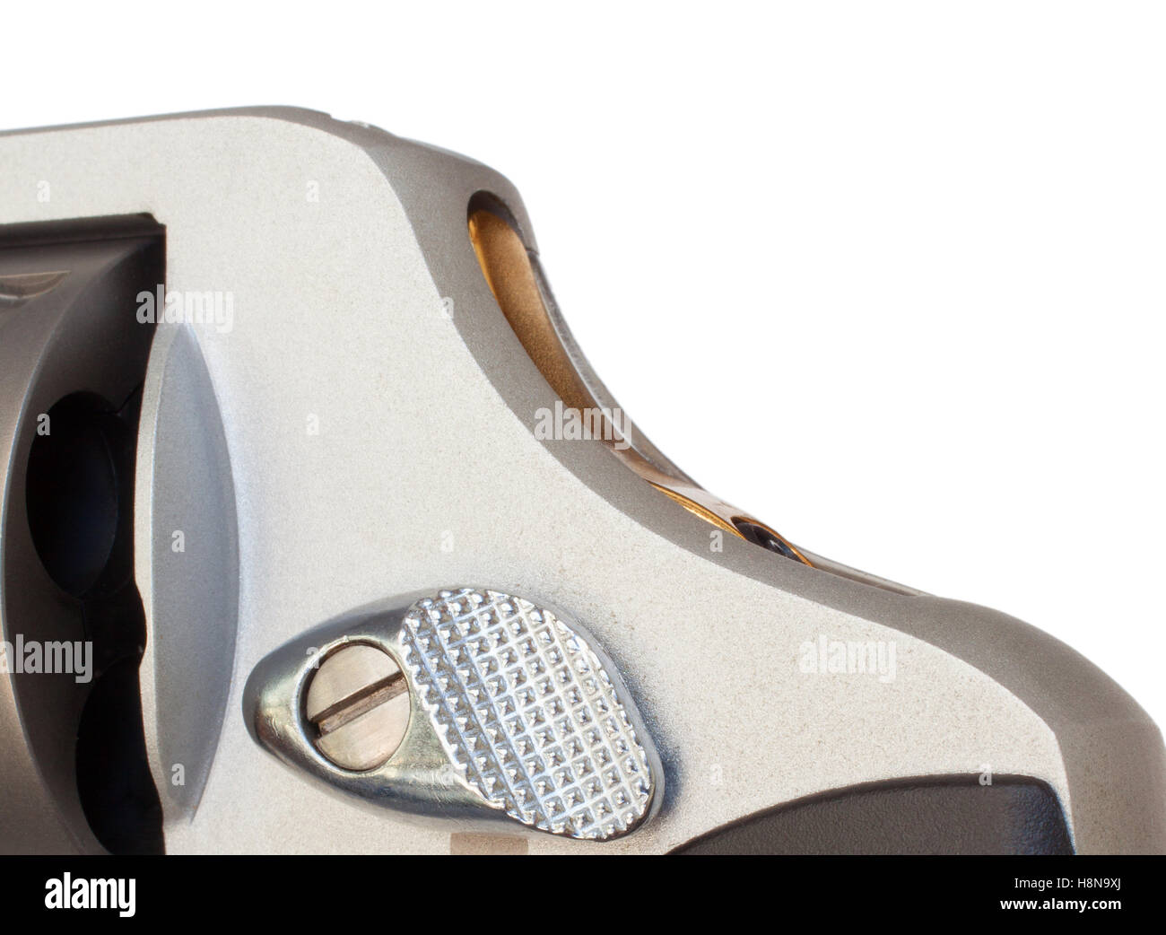 Gold colored hammer on a revolver that is flush with the frame Stock ...