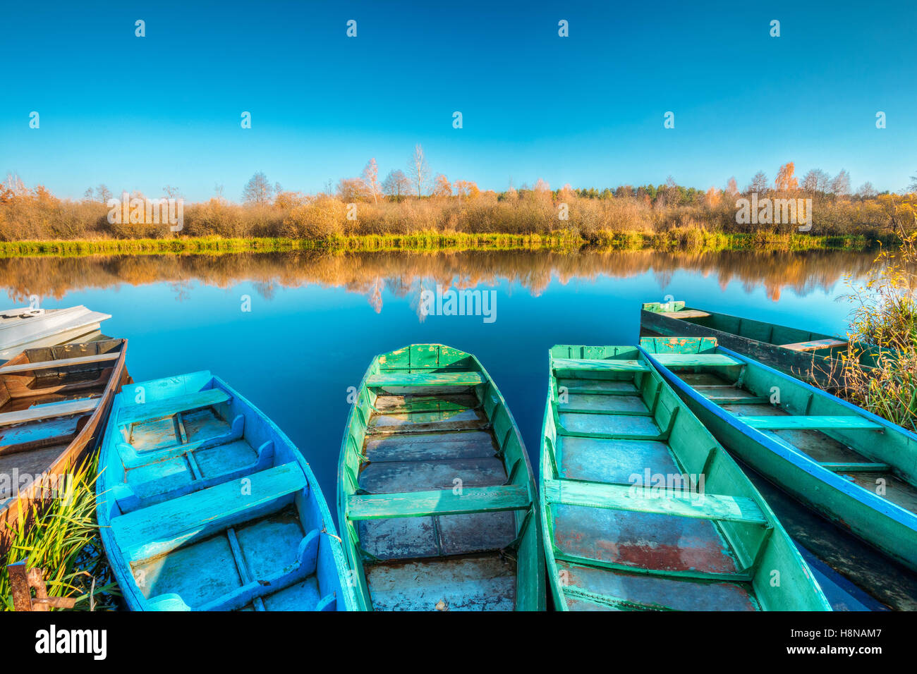 The Wooden Olden Fishing Blue Green Rowboats Skippets, Tied Up Next To ...
