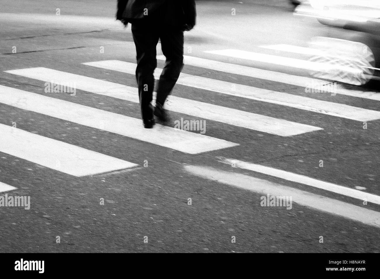 Men walking on zebra crossing street Stock Photo - Alamy