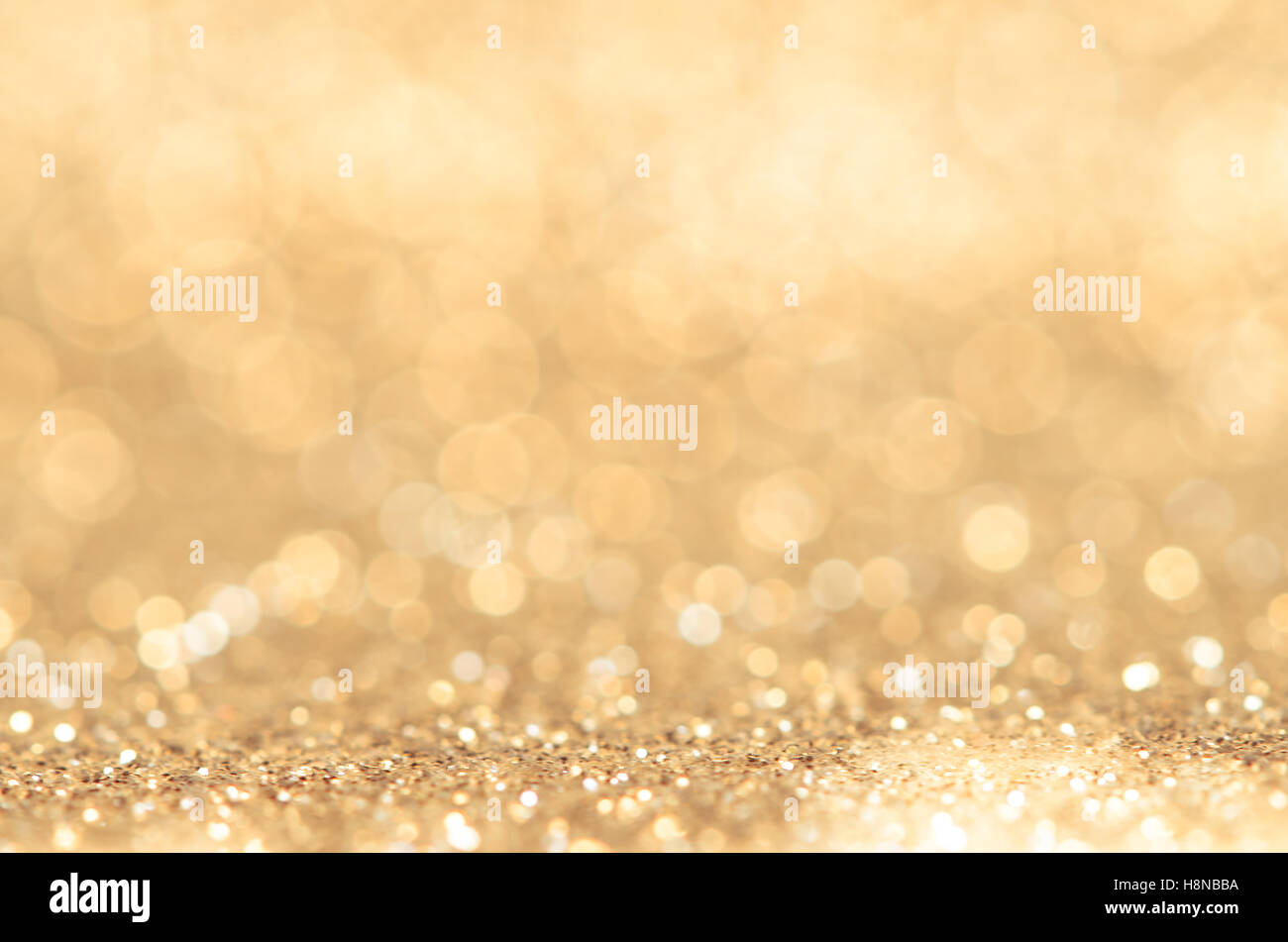 abstract golden glowing background image Stock Photo - Alamy