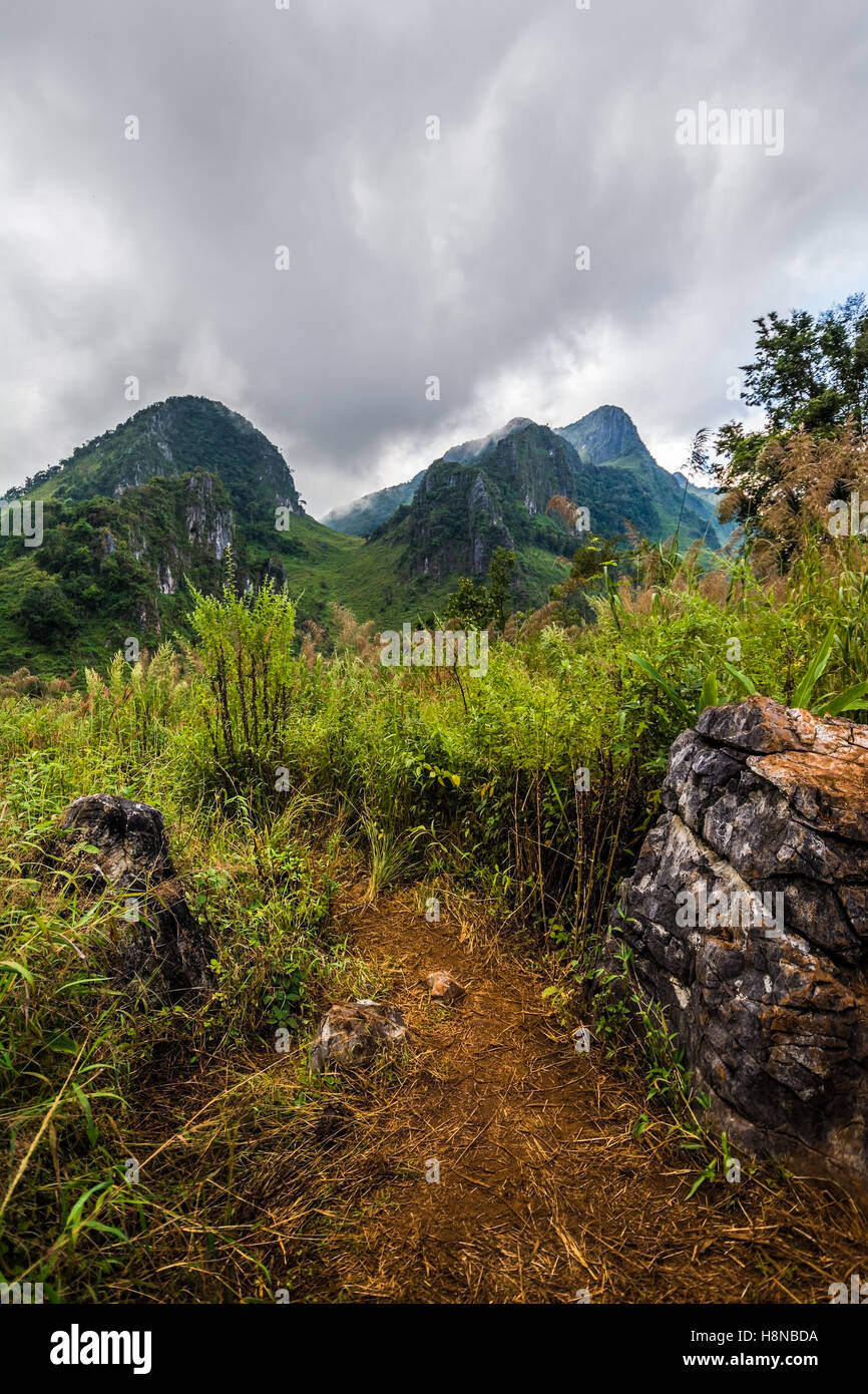 High mountain ridge in thick fog Stock Photo - Alamy