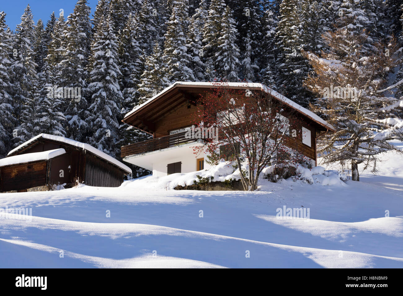 Small cottage in the mountains of the Switzerland Alps during the ...