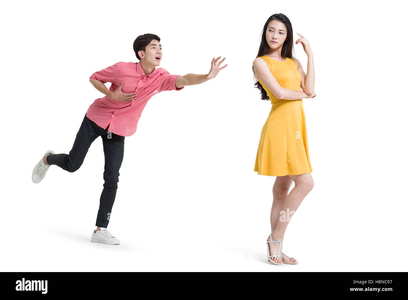 Young Chinese man express himself to a young woman Stock Photo - Alamy