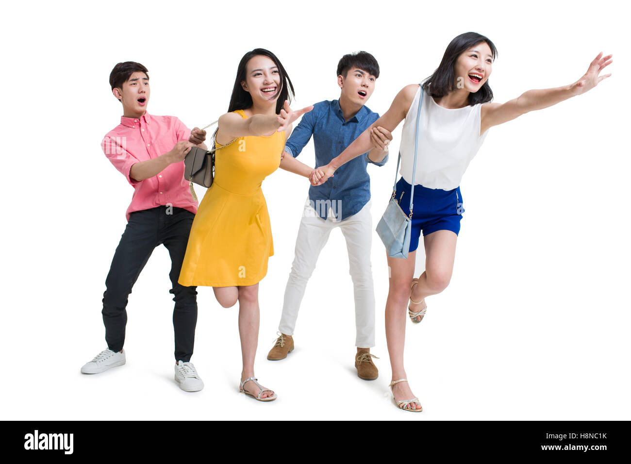 Happy young Chinese friends Stock Photo - Alamy