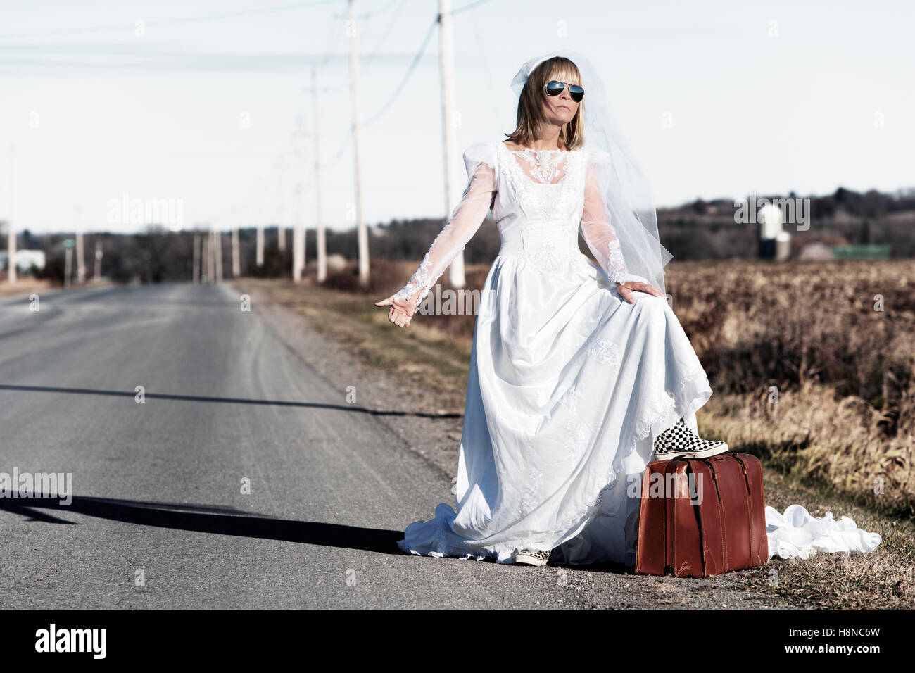 New bride leaving town Stock Photo - Alamy
