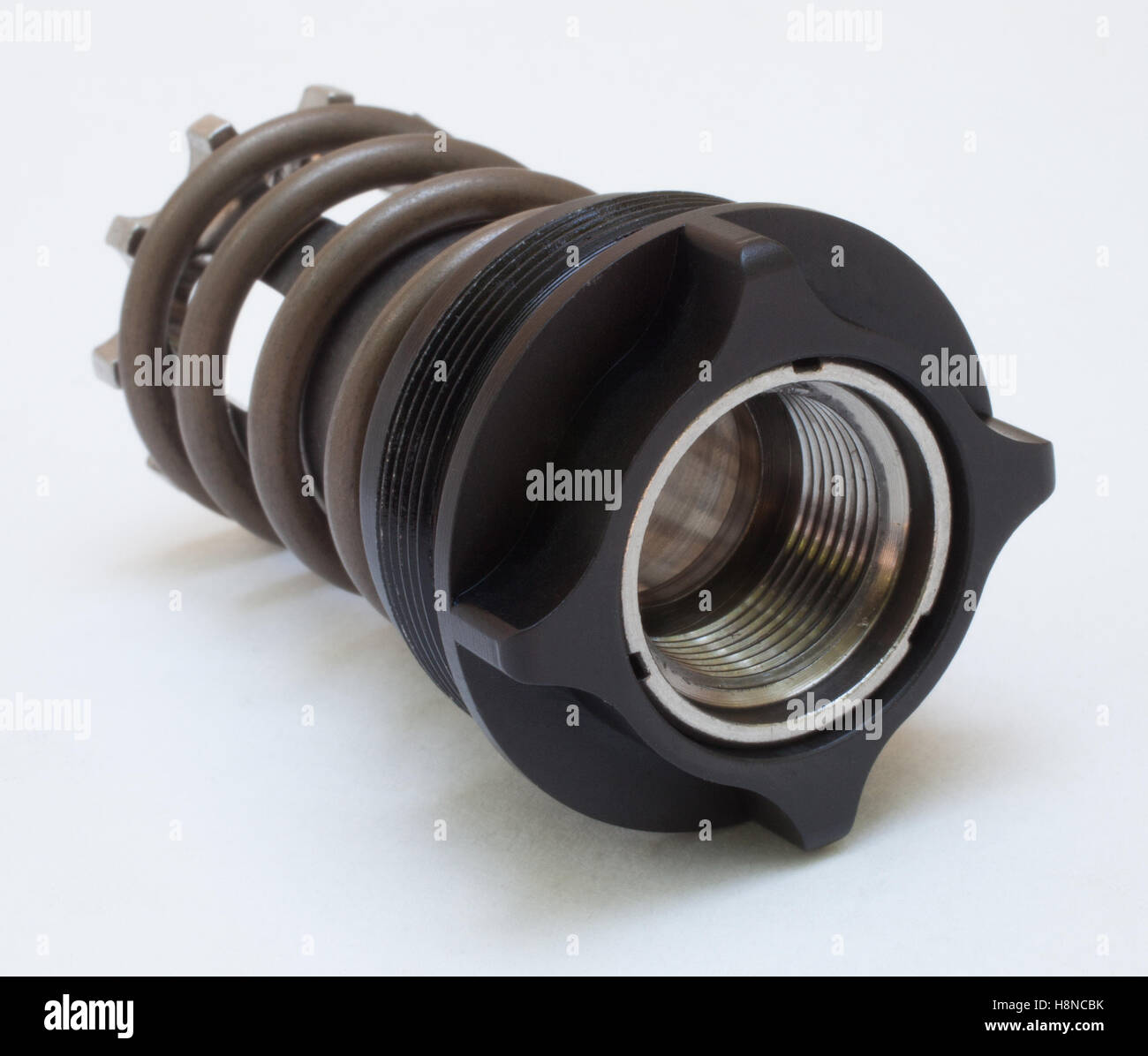 Valve that allows a suppressor to rotate on a white background Stock ...