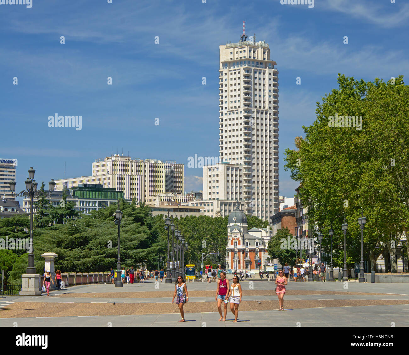 Huge Tower of Madrid (Torre de Madrid) with historic Spanish building ...
