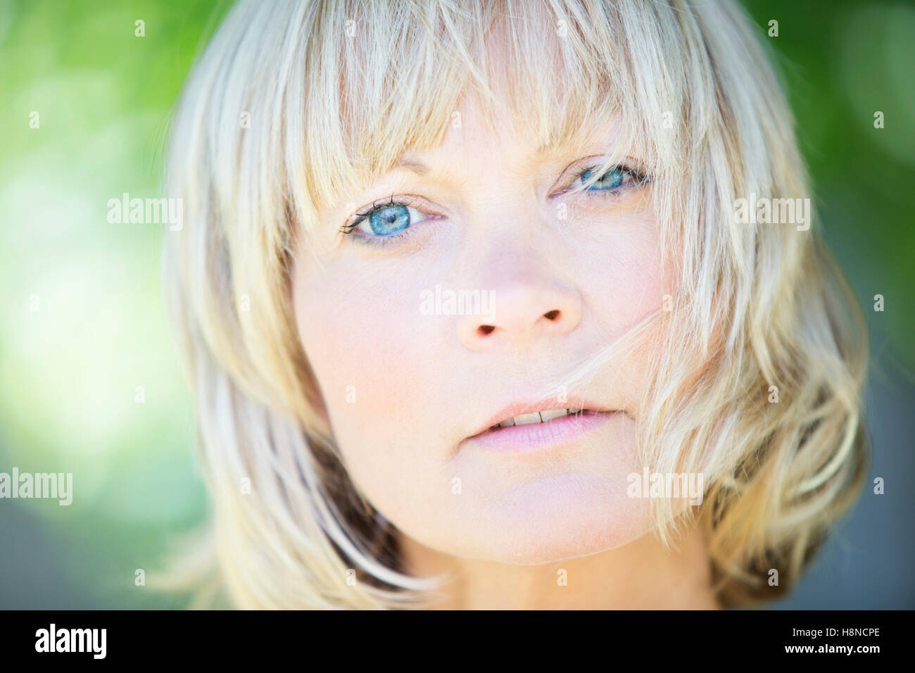 Young woman portrait face close hi-res stock photography and images - Alamy