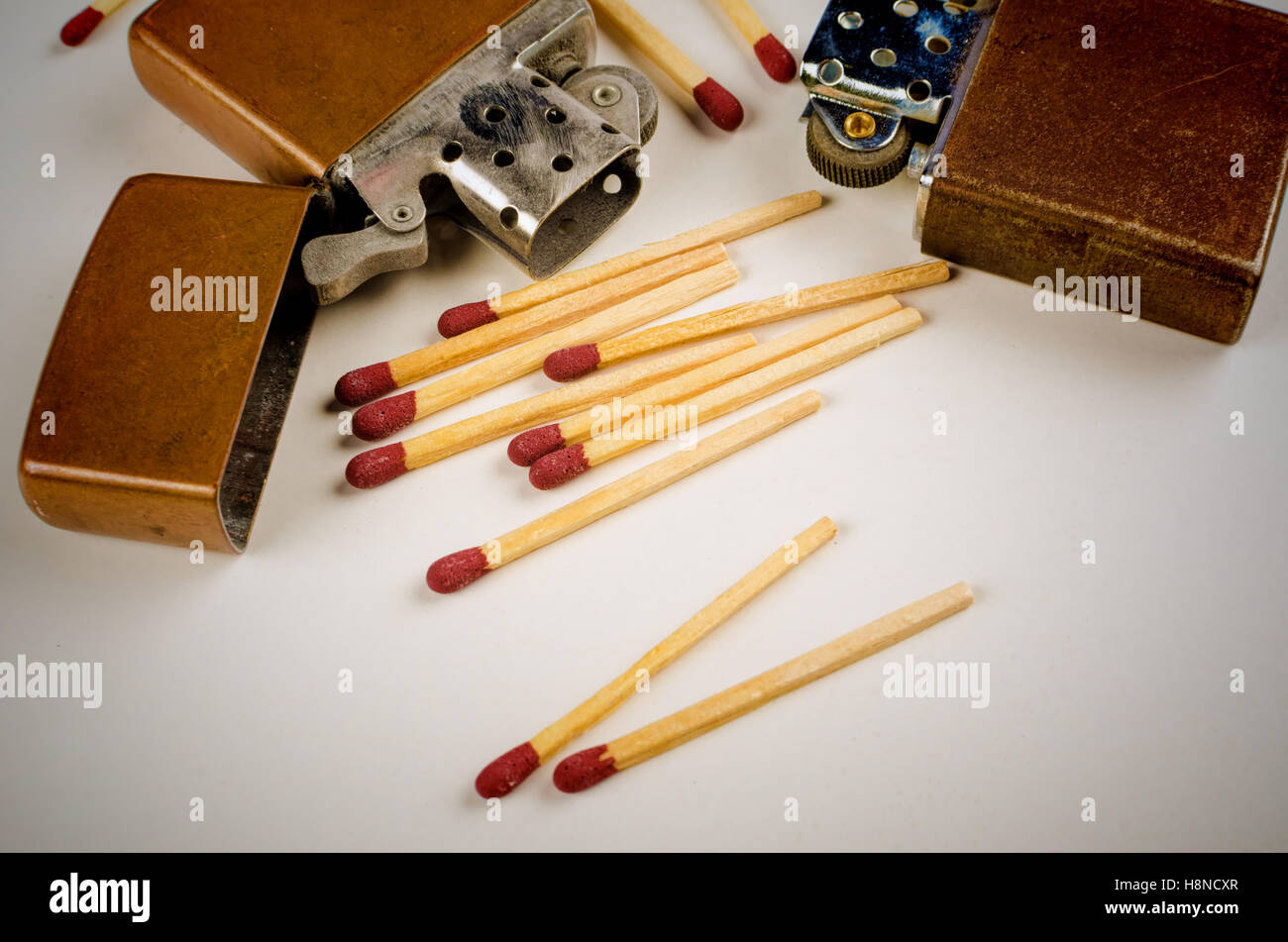Used retro lighter and matches in a studio shot still life Stock Photo ...