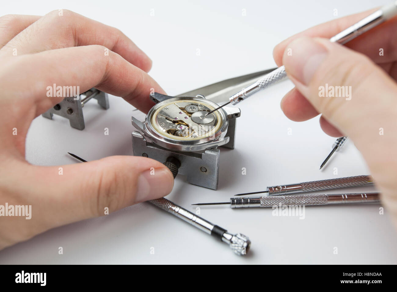 Chinese watchmaker repairing a wristwatch Stock Photo - Alamy