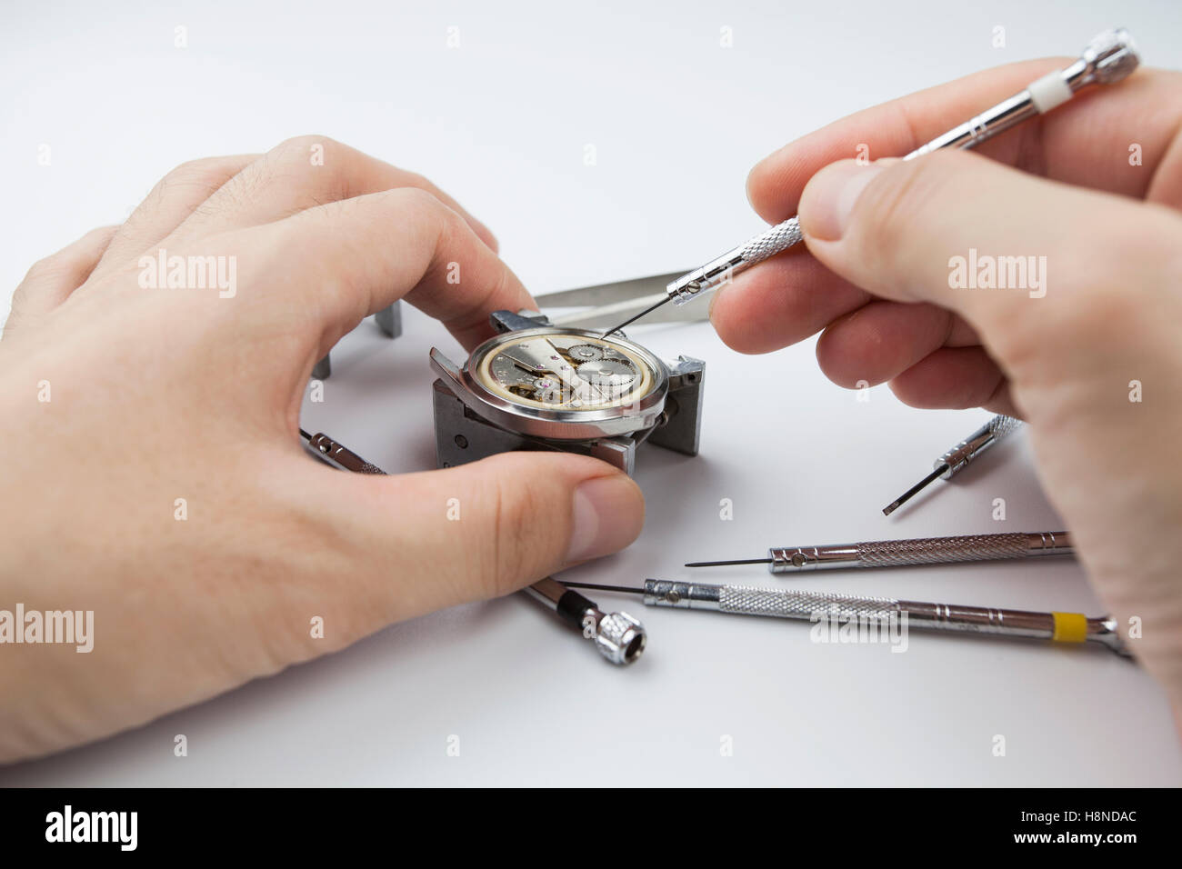 Chinese watchmaker repairing a wristwatch Stock Photo - Alamy