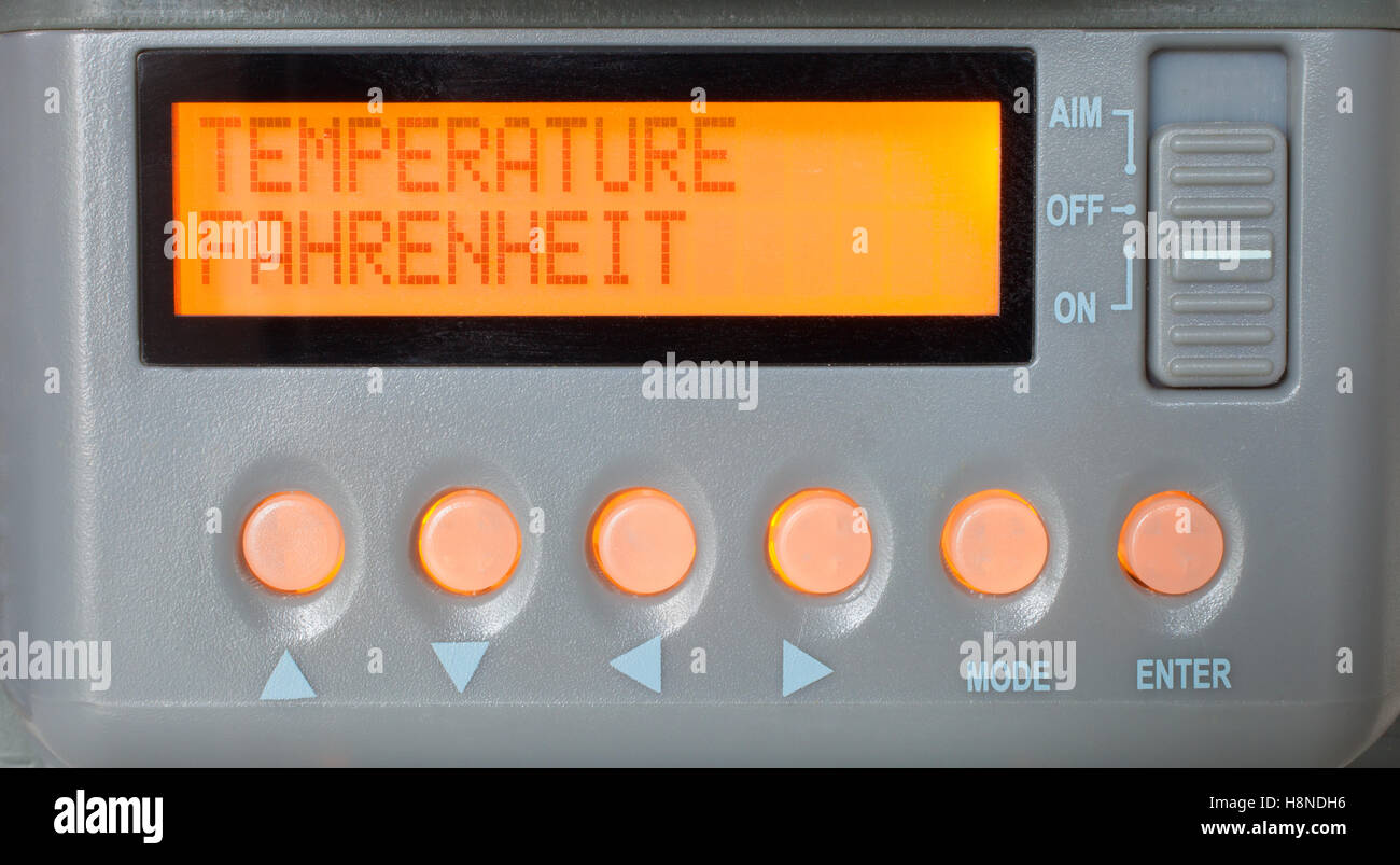 Input on a game camera to adjust temperature measurement Stock Photo ...