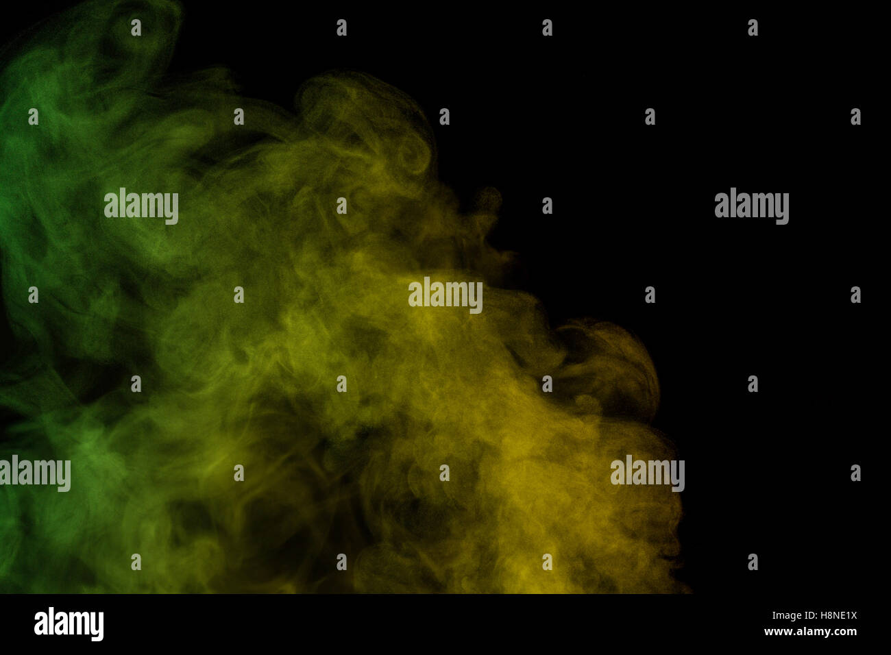 Abstract green yellow water vapor on a black background. Texture ...