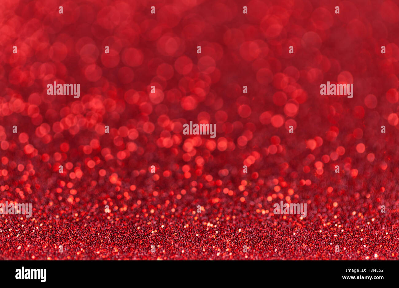 Bright red sparkling background from small sequins, closeup. Brilliant ...