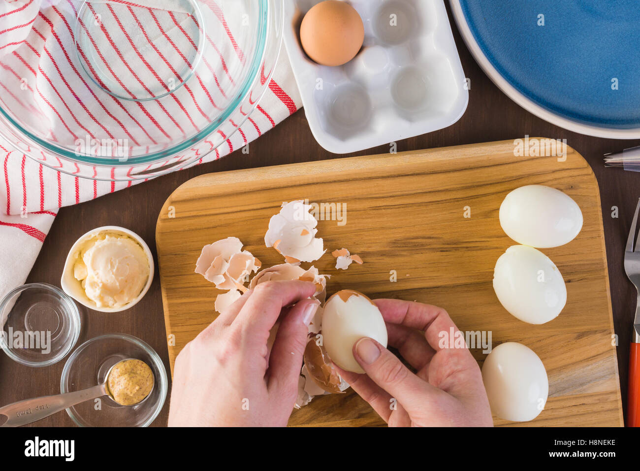 Preparing deviled eggs with organic eggs for appetizer. Step by step ...