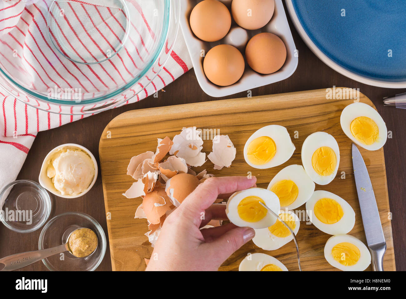 Preparing deviled eggs with organic eggs for appetizer. Step by step ...