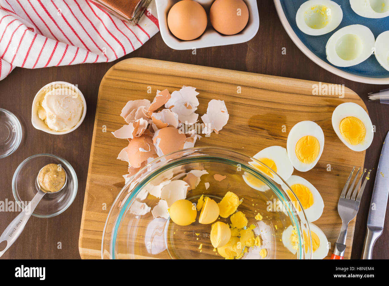 Preparing deviled eggs with organic eggs for appetizer. Step by step ...