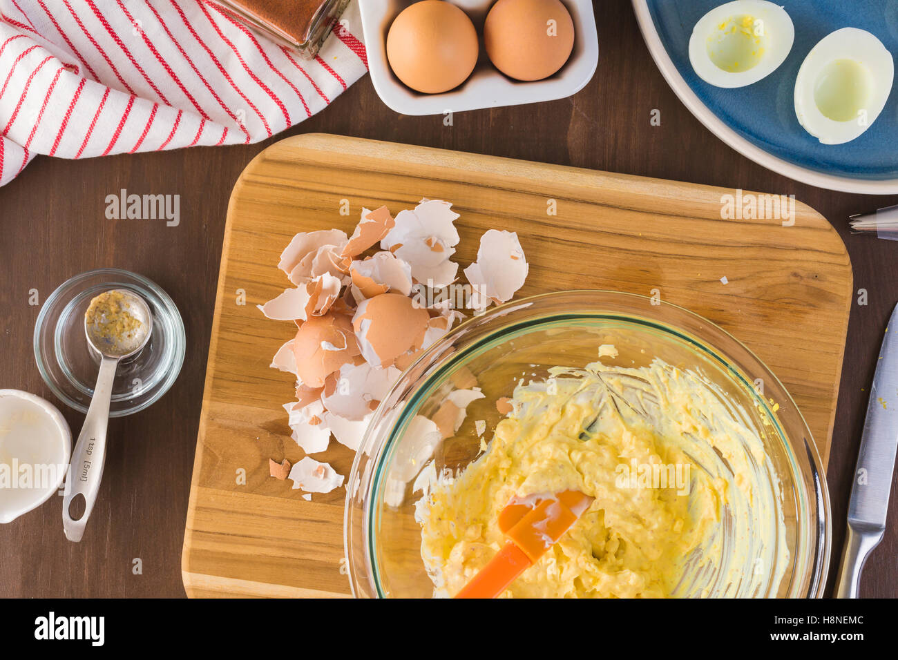 Preparing deviled eggs with organic eggs for appetizer. Step by step ...