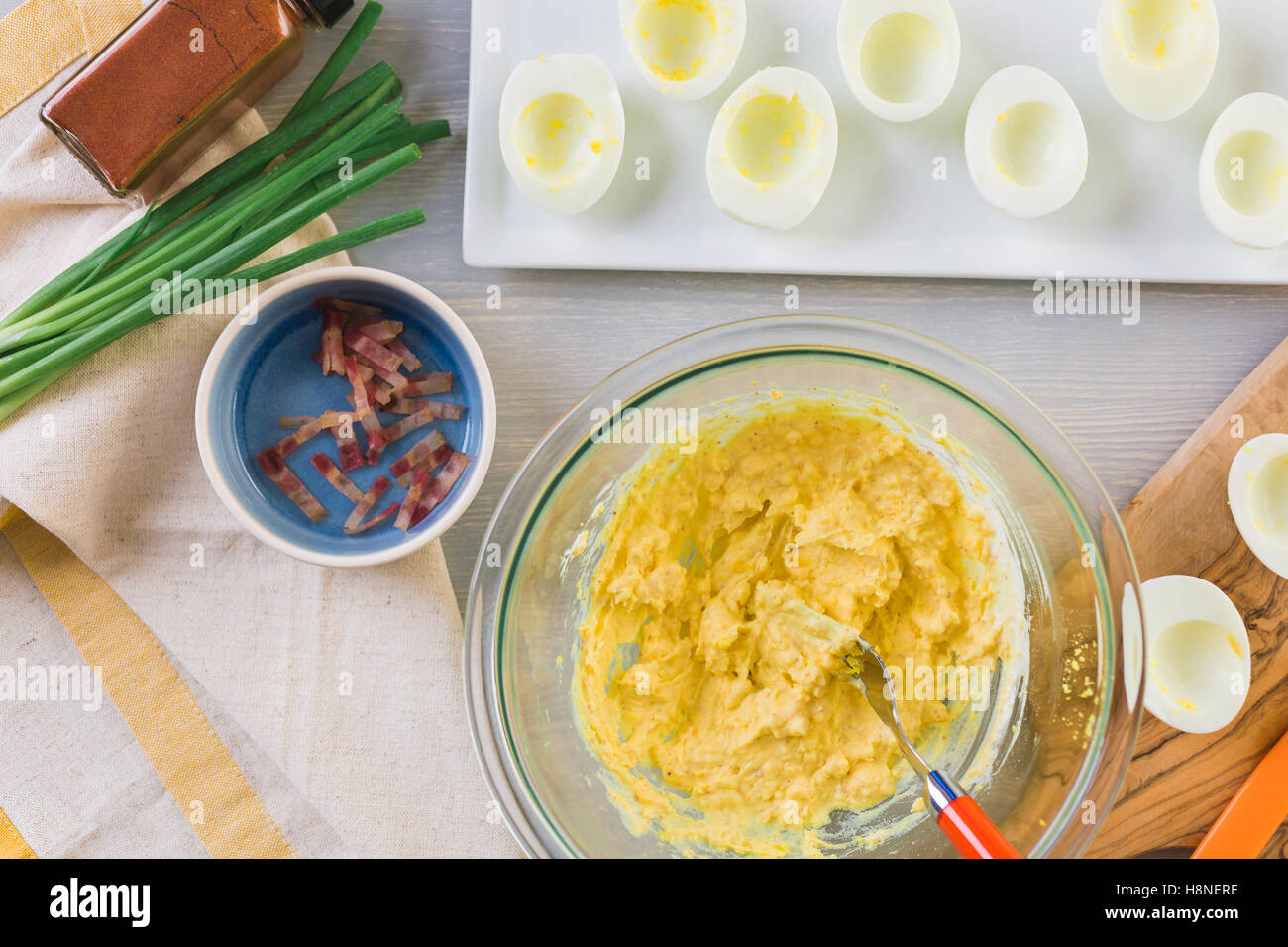 Preparing deviled eggs with organic eggs for appetizer. Step by step ...