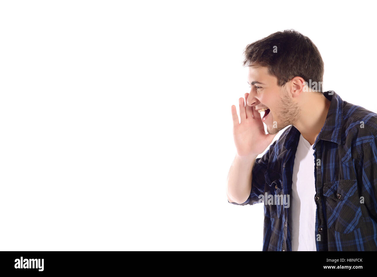 Portrait of a young man shouting. Isolated white background Stock Photo ...