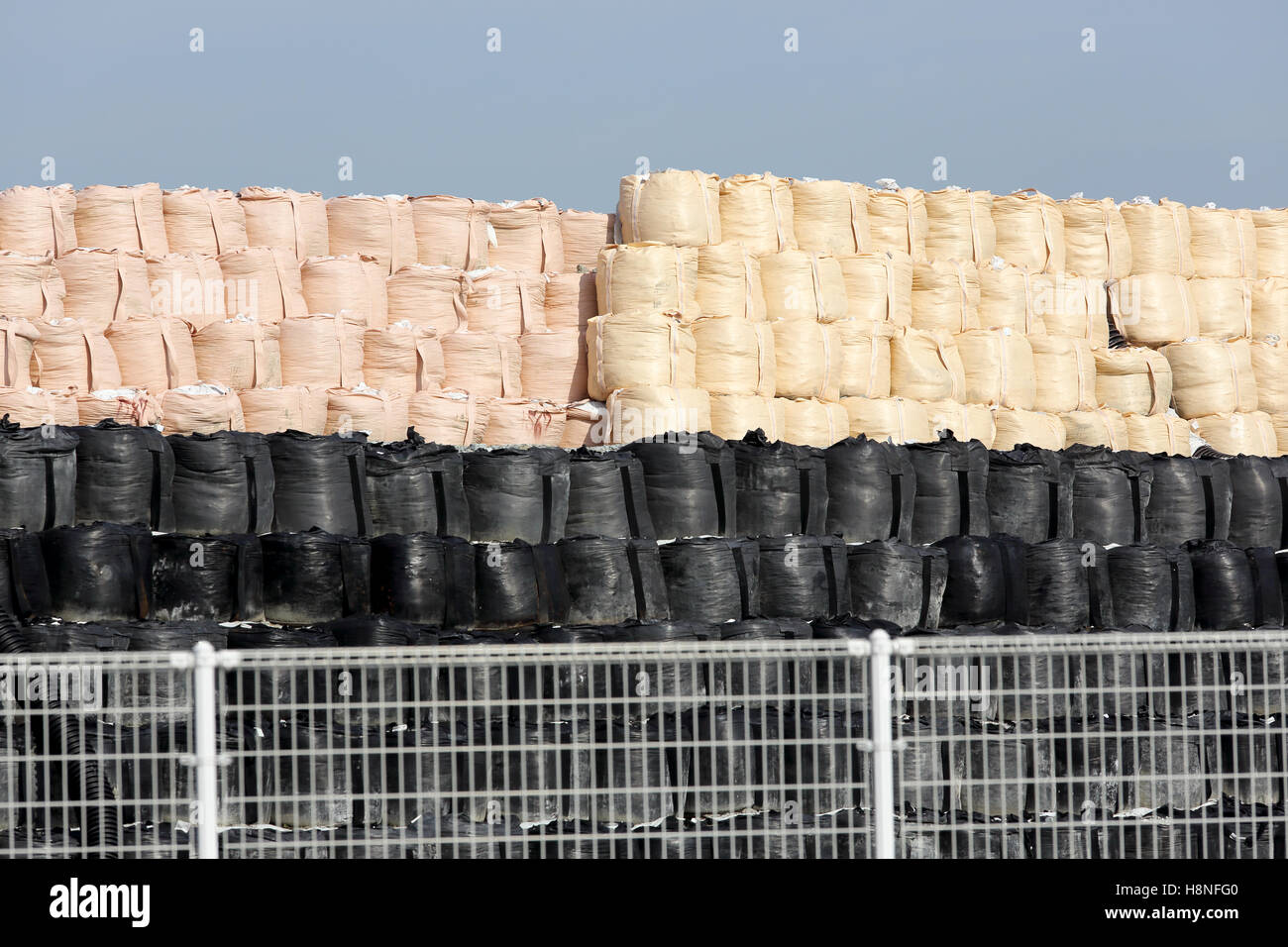 stack of toxic substance bag against a blue sky Stock Photo - Alamy