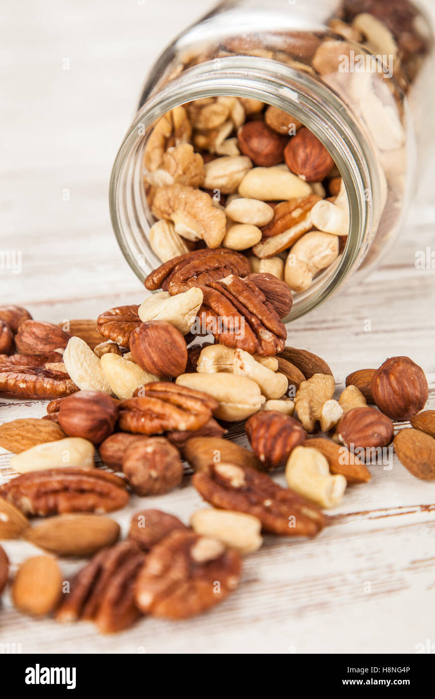 Mix of different nuts closeup photo Stock Photo - Alamy