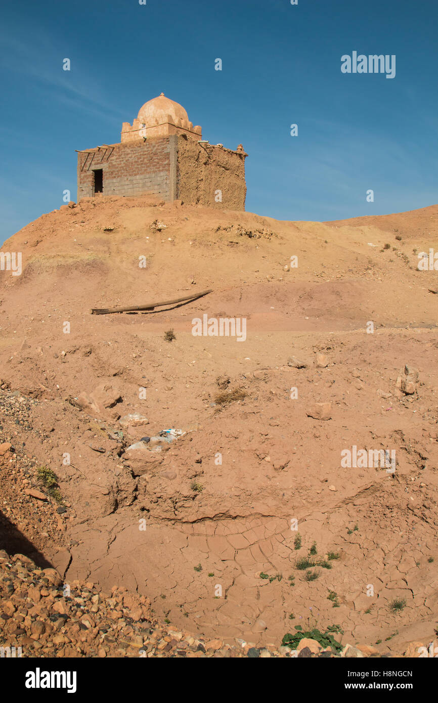 Old and not finished construction of a mosque on hill beside the road ...