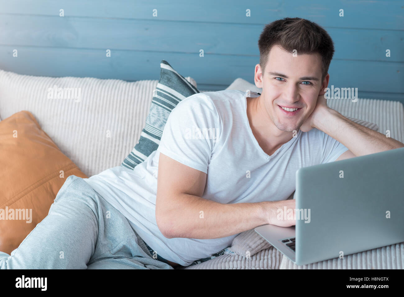 Emotional smiling man using hi-res stock photography and images - Alamy
