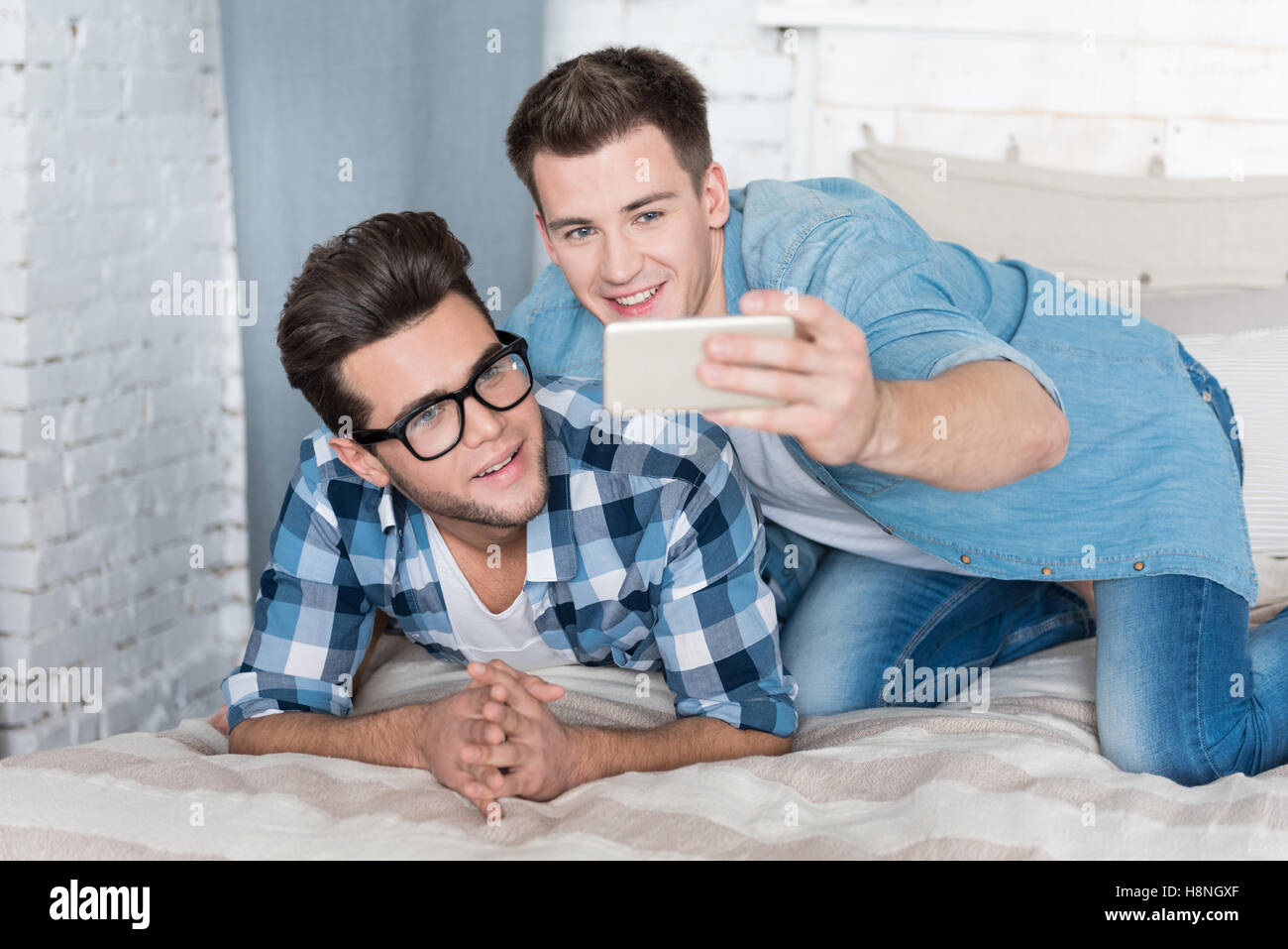 Smile homosexuality orientation bed hi-res stock photography and images ...
